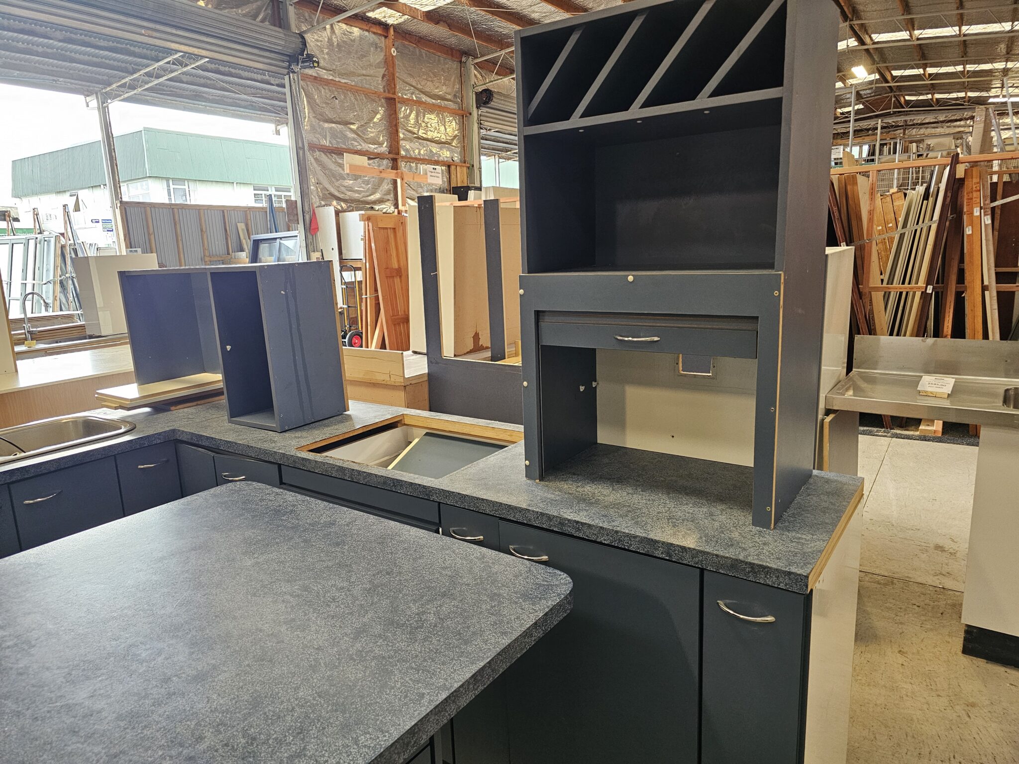 Blue L Shape Kitchen with a Blue Benchtop | Musgroves Ltd