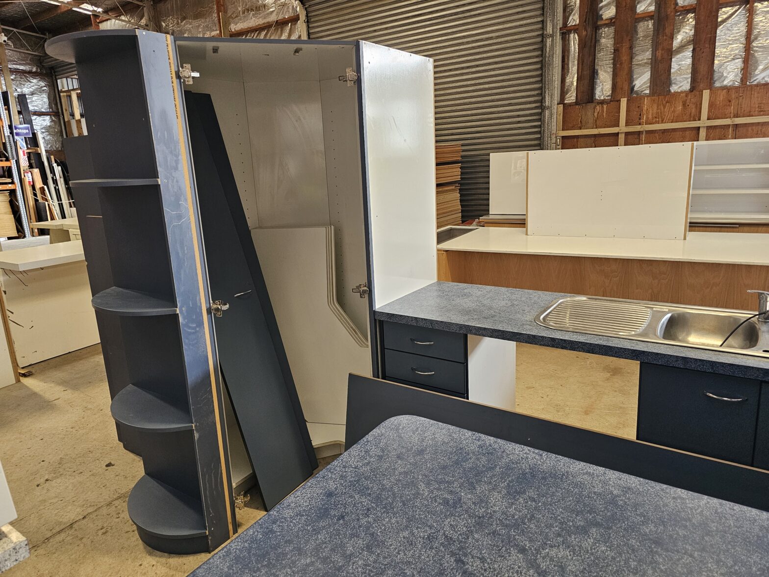 Blue L Shape Kitchen with a Blue Benchtop | Musgroves Ltd
